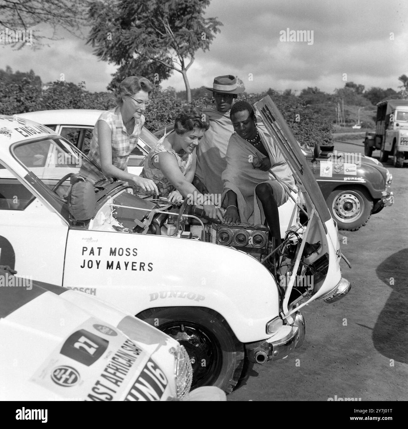 MOTOR RALLY EAST AFRICAN SAFARI WOMAN LOOKS UNDER BONNET - PAT MOSS AND ...