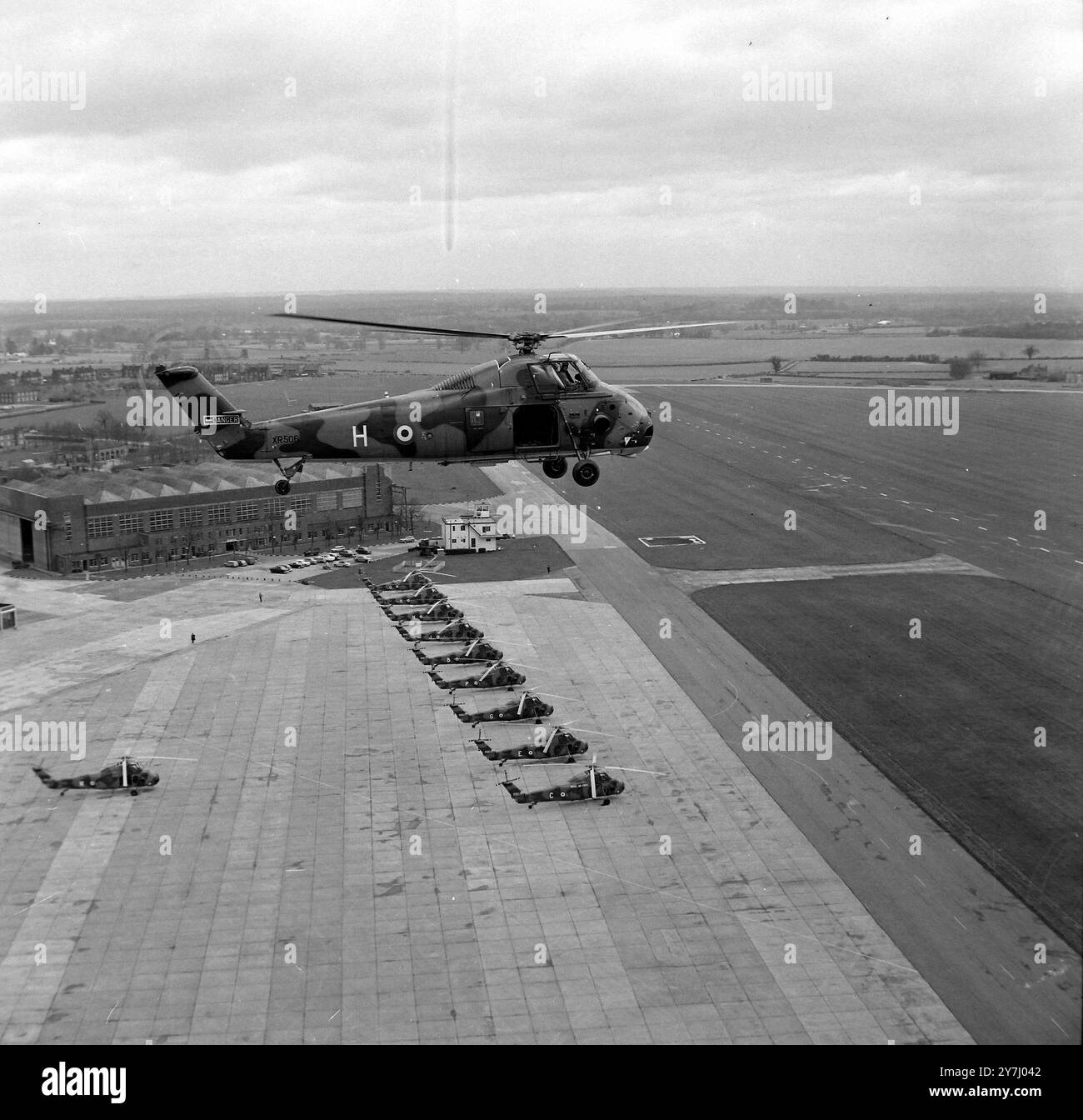 AVIATION HELICOPTER HOVERS RAF IN ODIHAM, HAMPSHIRE ; 25 MARCH 1964 ...
