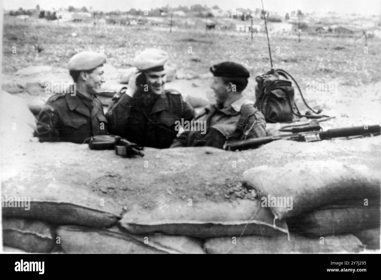 ARMY CANADIAN TROOPS LOOK OVER PARATROOPER POSITIONS IN NICOSIA, CYPRUS ...