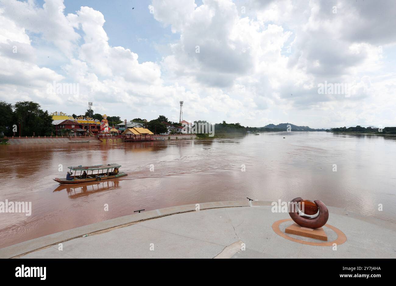 A boatman rides the past Pasan, the iconic buildings of the beginning ...