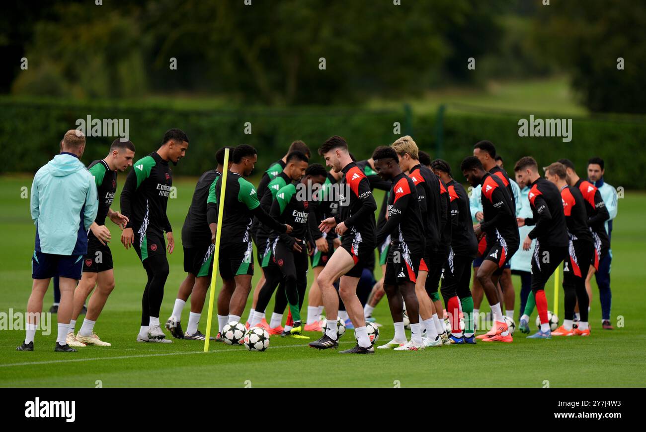 The Arsenal players line up during a training session at Sobha Realty ...