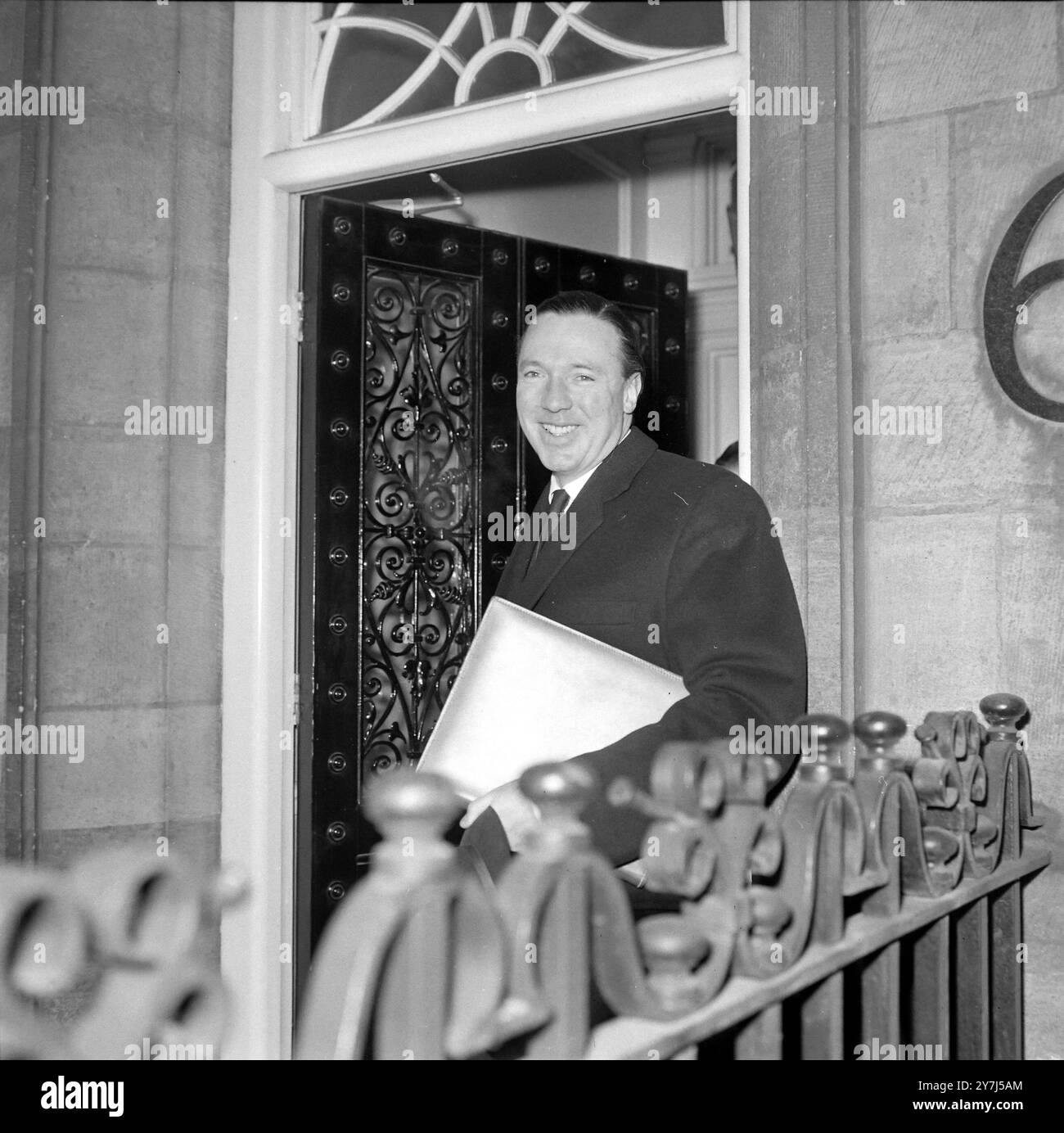 JOHN AMBLER AT HOME IN LONDON ; 4 MARCH 1964 Stock Photo - Alamy
