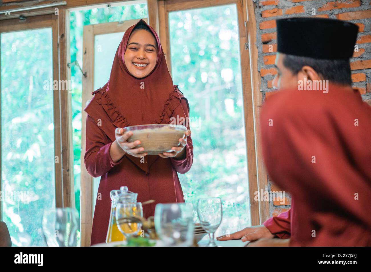 Joyful Celebration Delightfully Serving a Traditional Dish During Family Gathering Event Stock ...