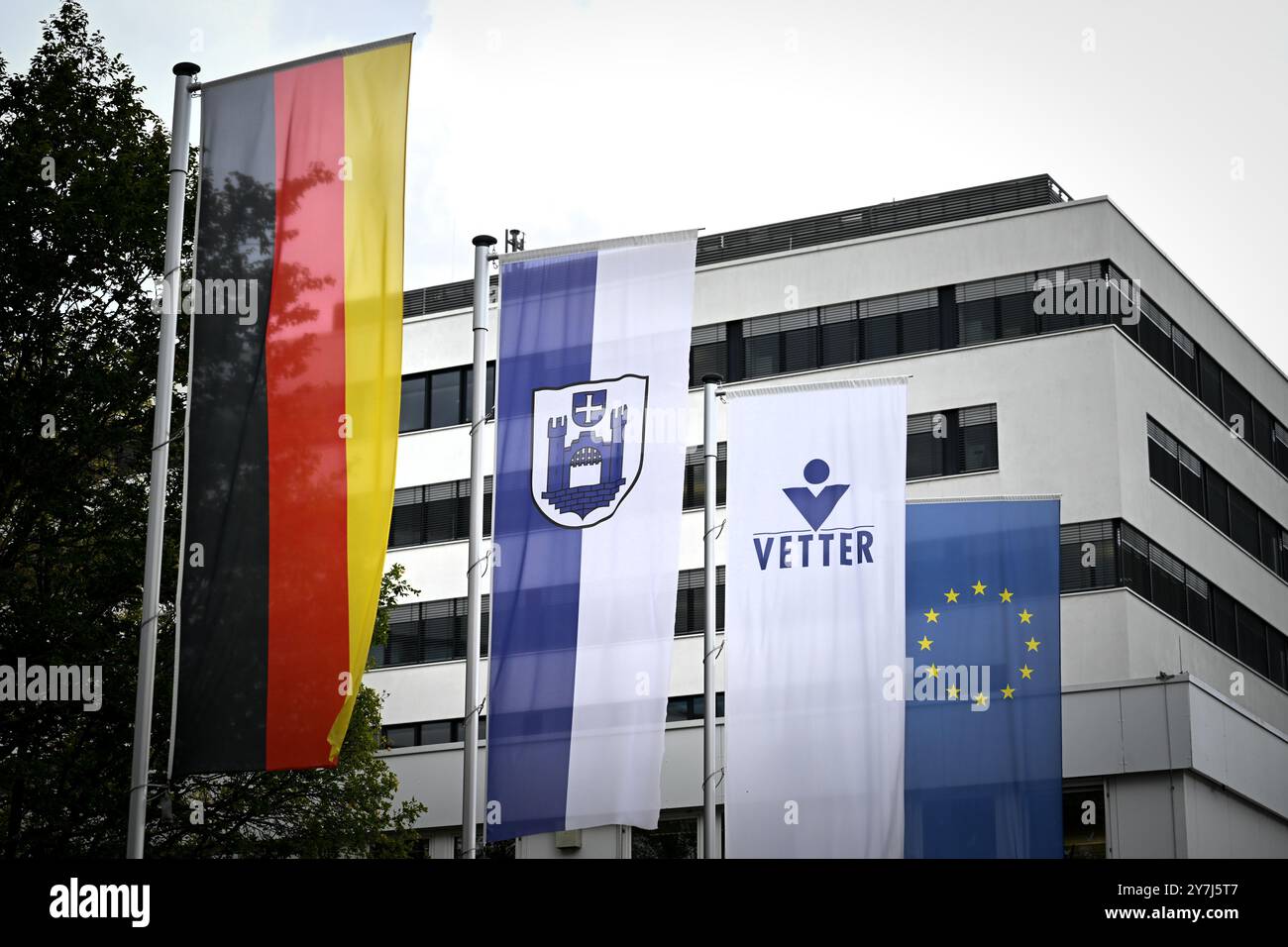 Ravensburg, Germany. 16th Sep, 2024. Four flags hang in front of the ...