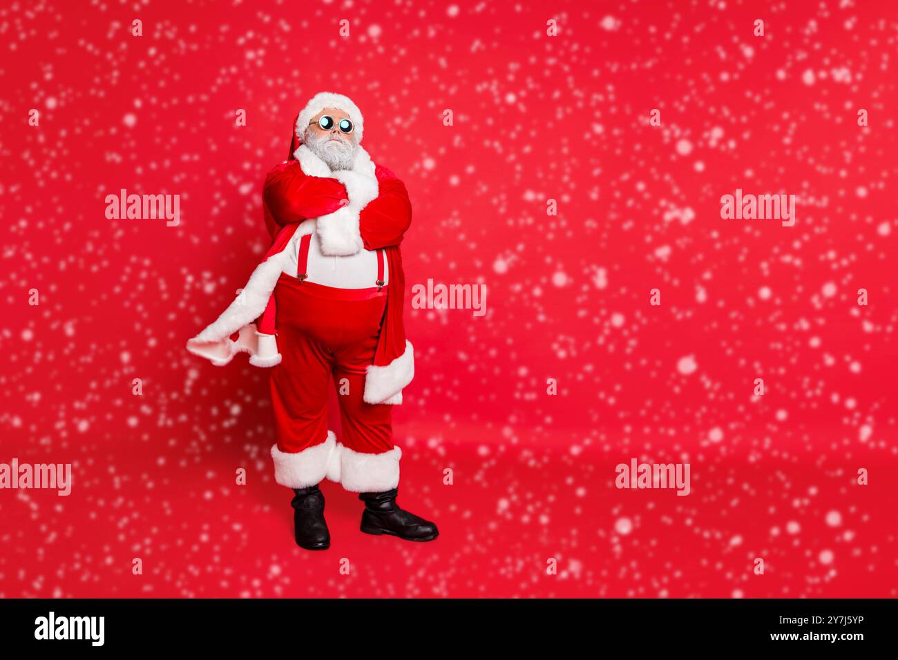 Full length photo of minded fat overweight santa claus bad guy with his ...