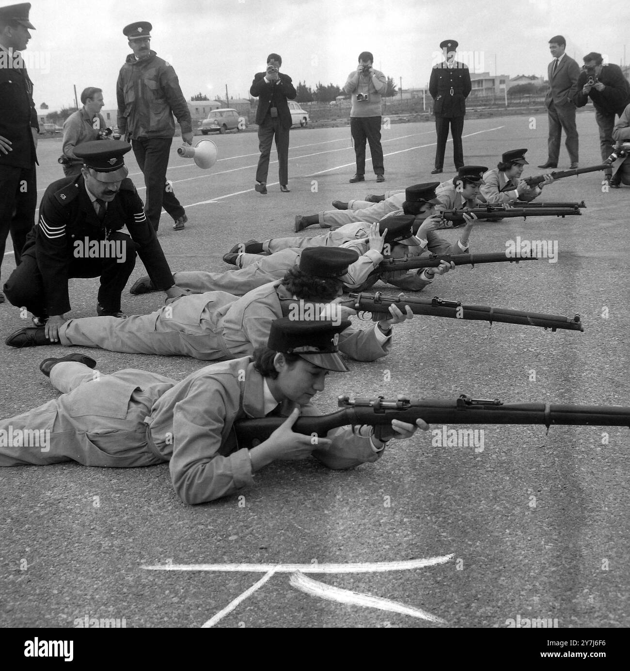 POLICE GREEK POLICEWOMAN RECEIVE INSTRUCTIONS ON RIFLE RANGE IN NICOSIA ...