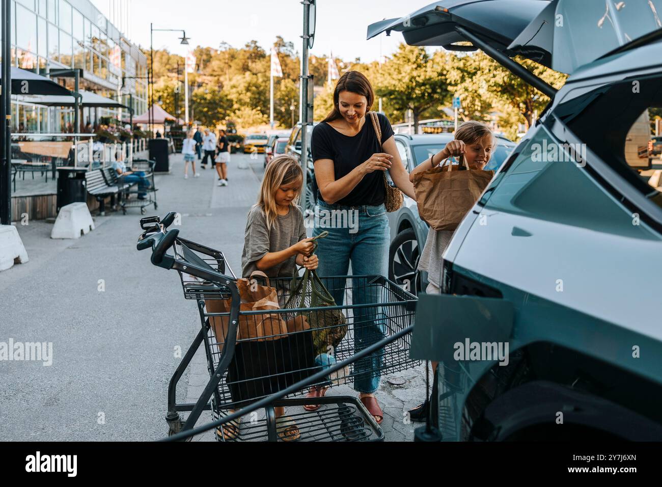Mature women hand picking up hi-res stock photography and images - Alamy