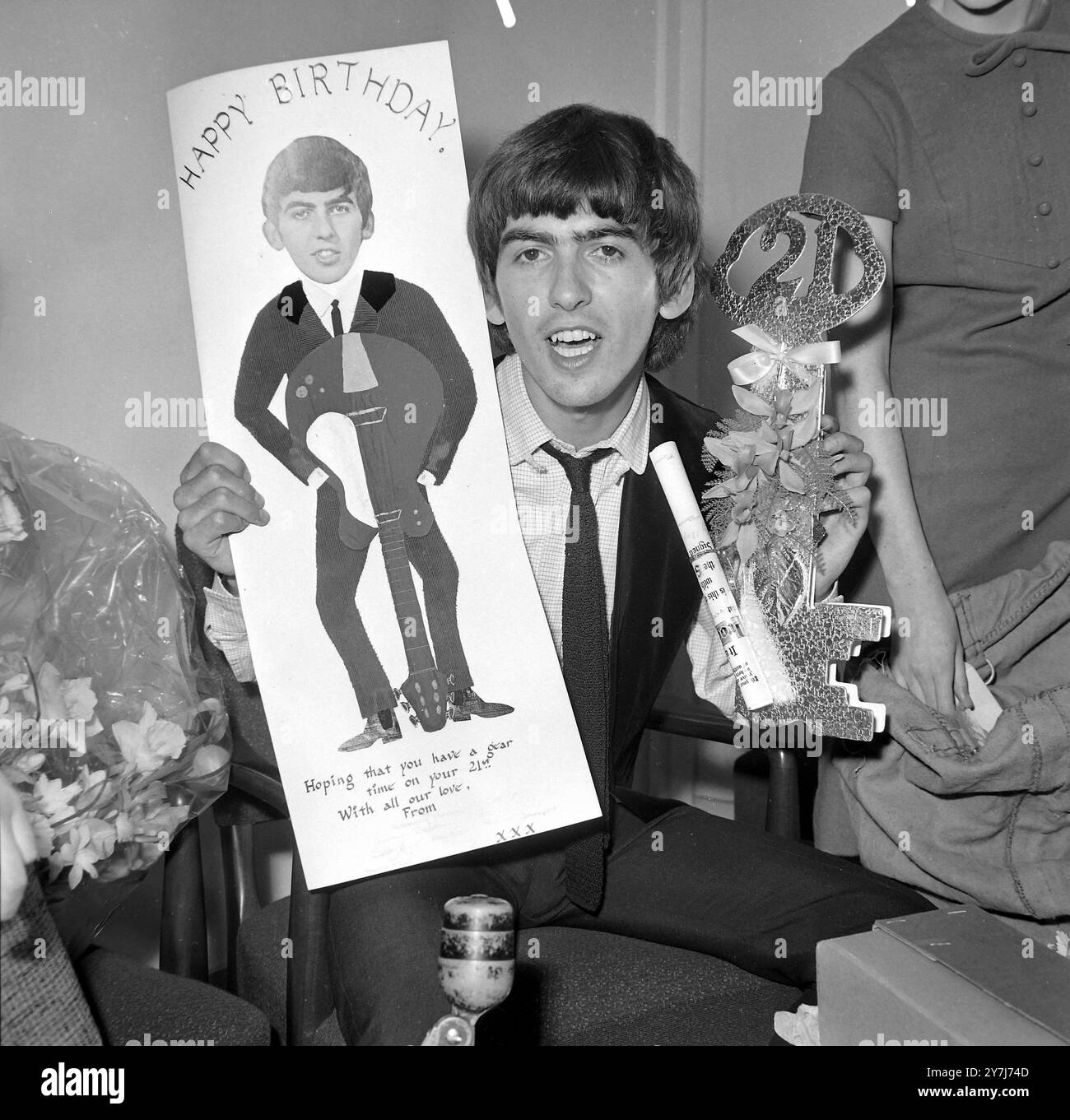 25 FEBRUARY 1964 GEORGE HARRISON OF THE BEATLES CELEBRATES HIS 21ST ...