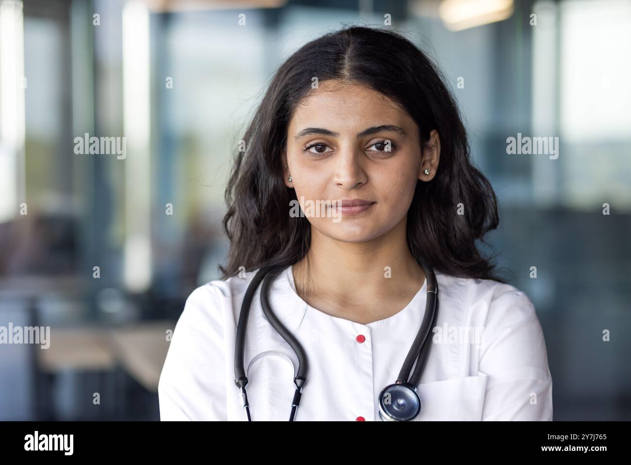 Young female doctor with stethoscope exudes confidence and ...