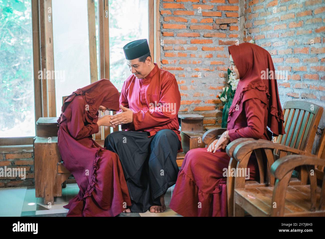 girls take shaking hands with mother and father to forgive at village ...