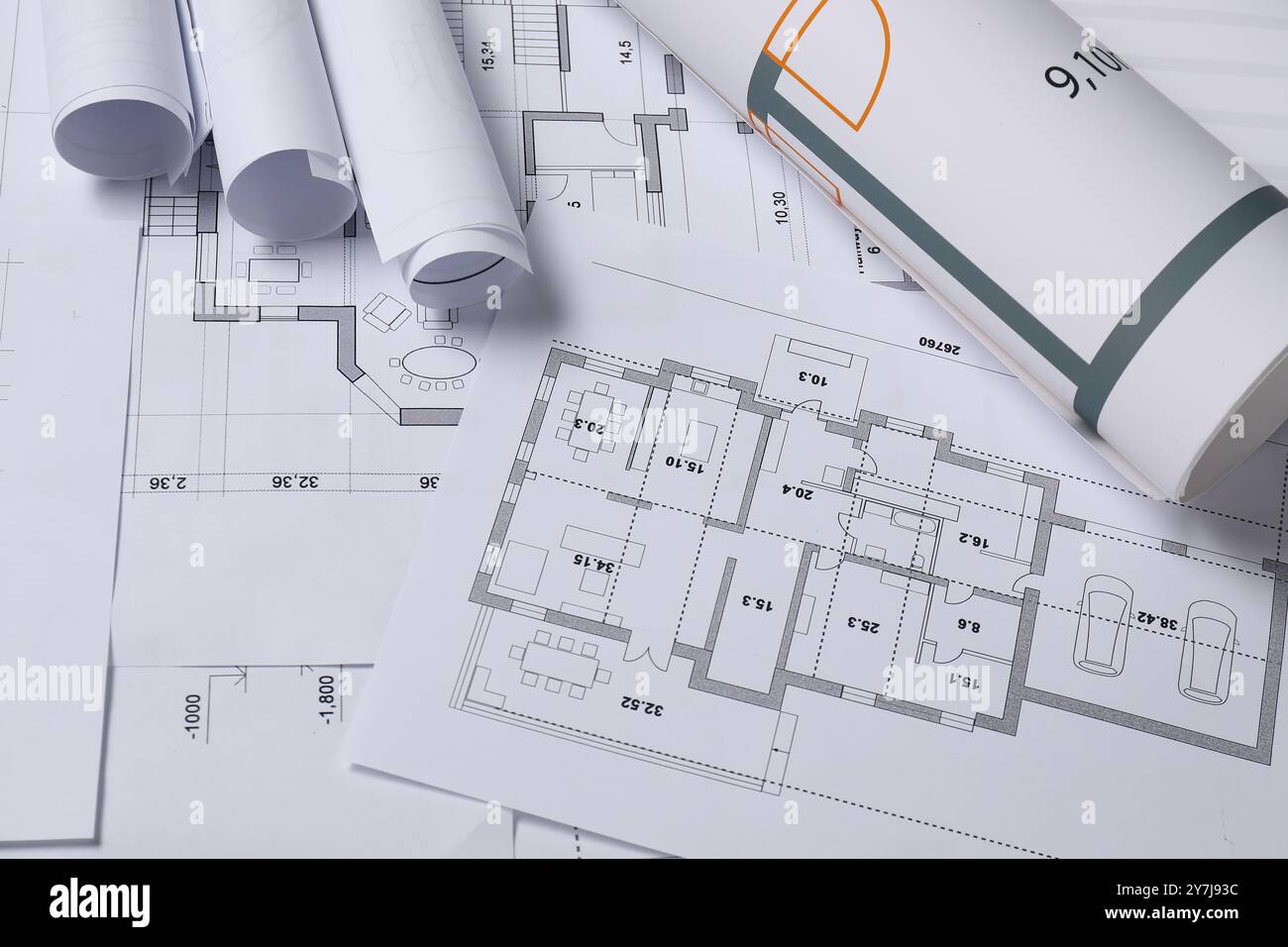 Different architectural drawings on table, above view Stock Photo - Alamy