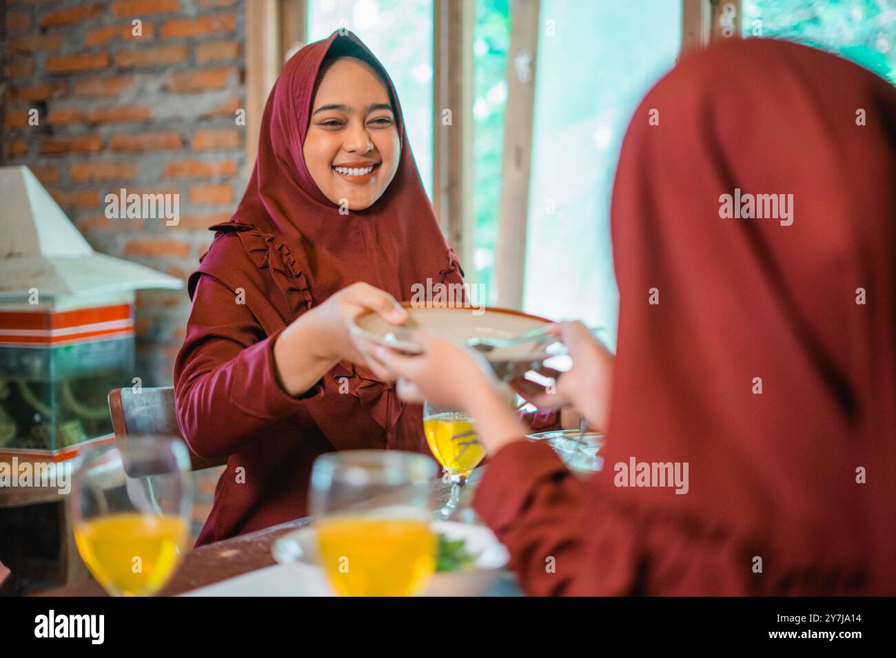 Joyful Sharing Moment A Group of Women Dining Together in Traditional ...