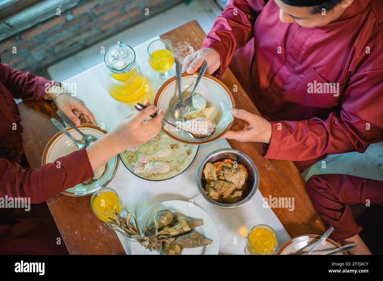 Enjoy a traditional family meal with diverse dishes and refreshing ...