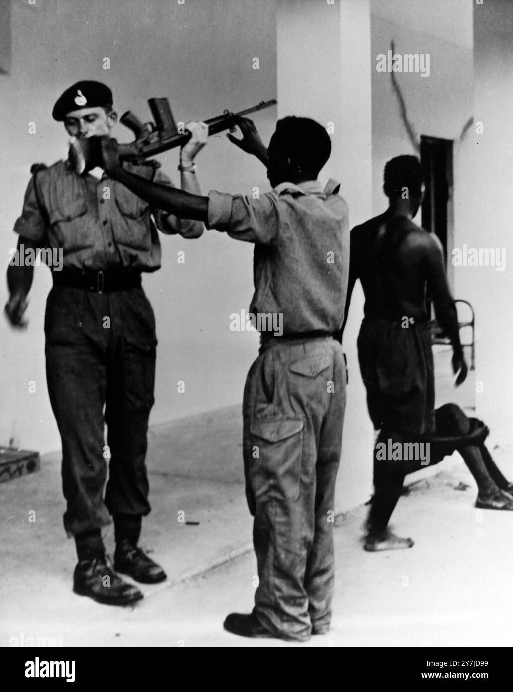 ARMY SOLDIER DISARMED BY BRITISH MARINE IN DAR ES SALAAM, TANGANYIKA ...