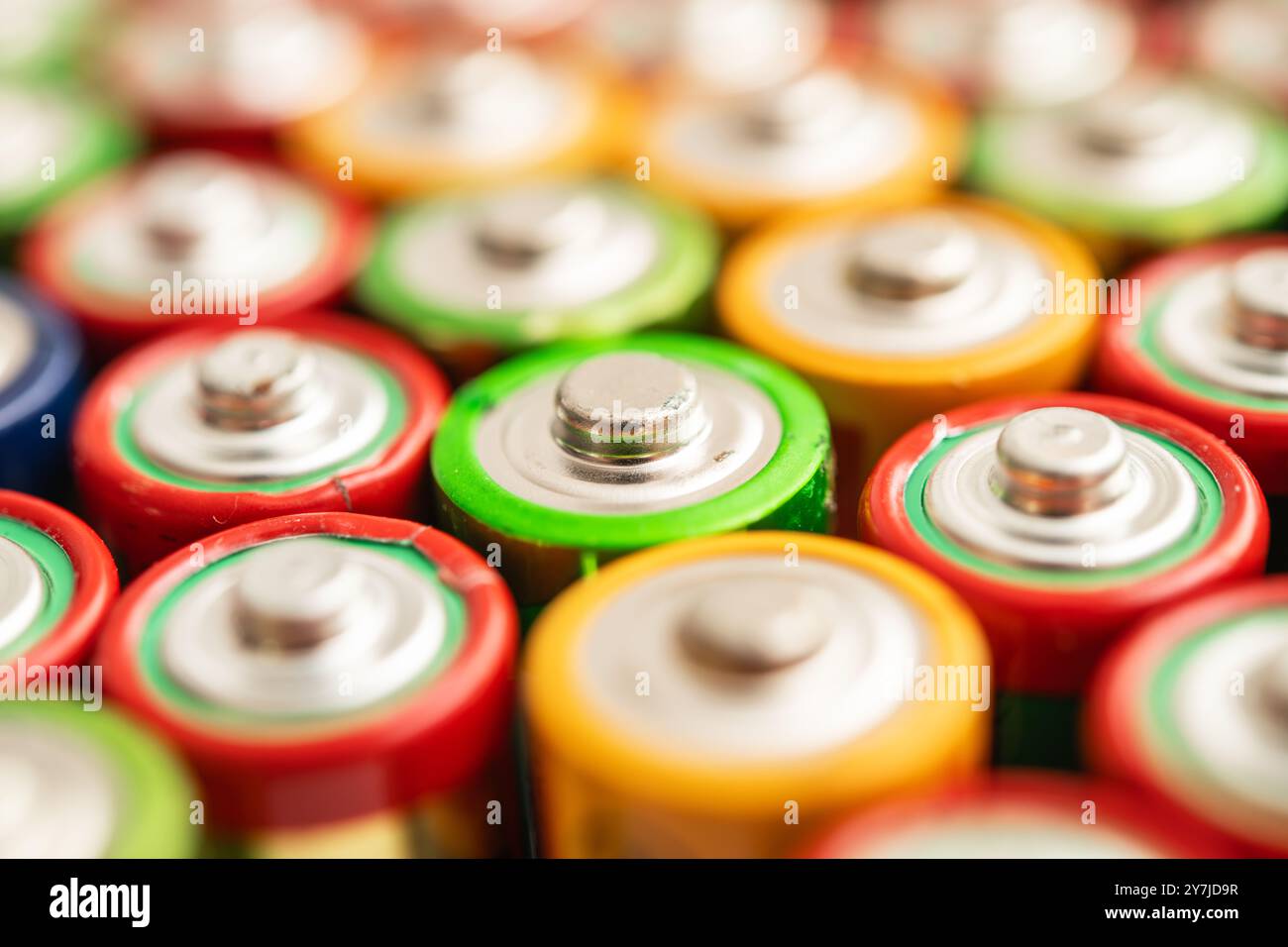 A vibrant collection of batteries in different colors and sizes ...