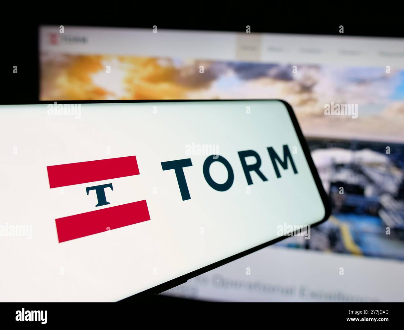 Smartphone with logo of Danish shipping company TORM plc on screen in ...