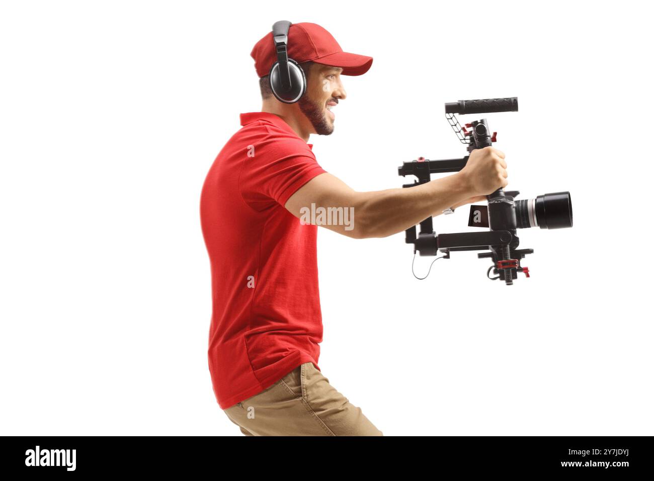 Camera operator using a stabilizer and recording isolated on white ...