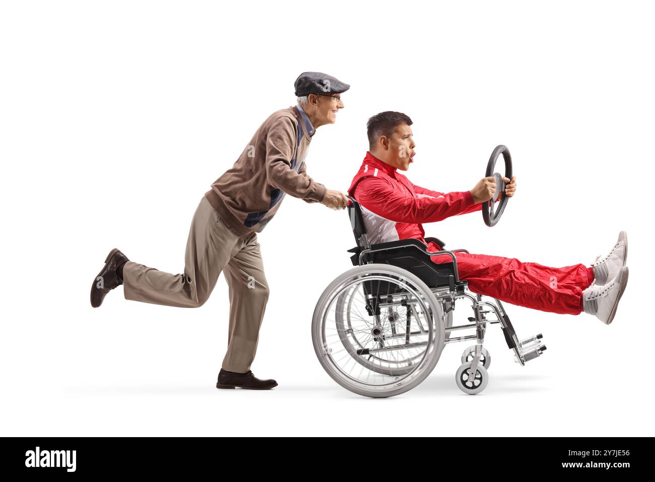 Elderly man pushing a car racer in a wheelchair isolated on white ...