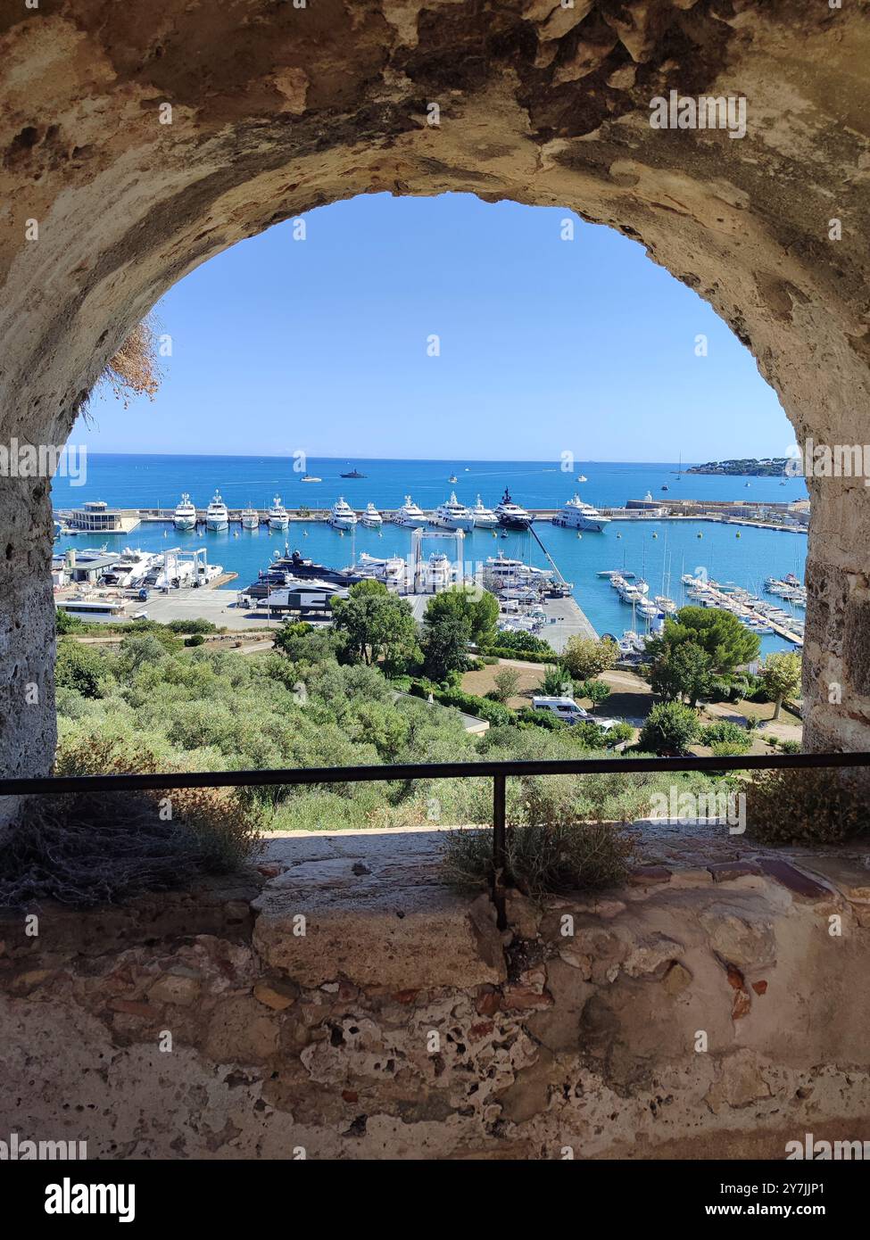 A Beautiful Scenic View of a Picturesque Harbor Through an Old Historic ...