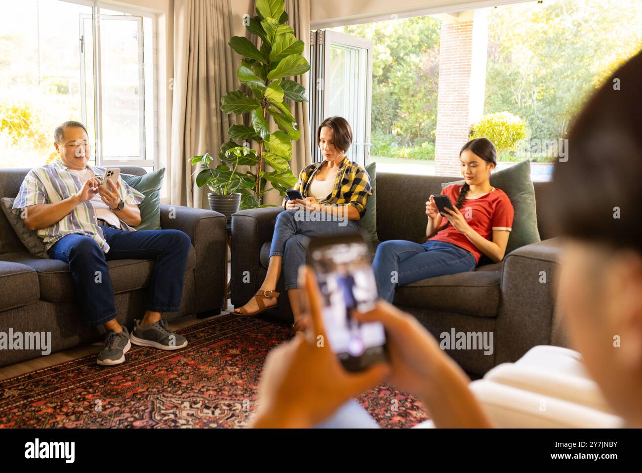 Father son using modern smartphones hi-res stock photography and images ...