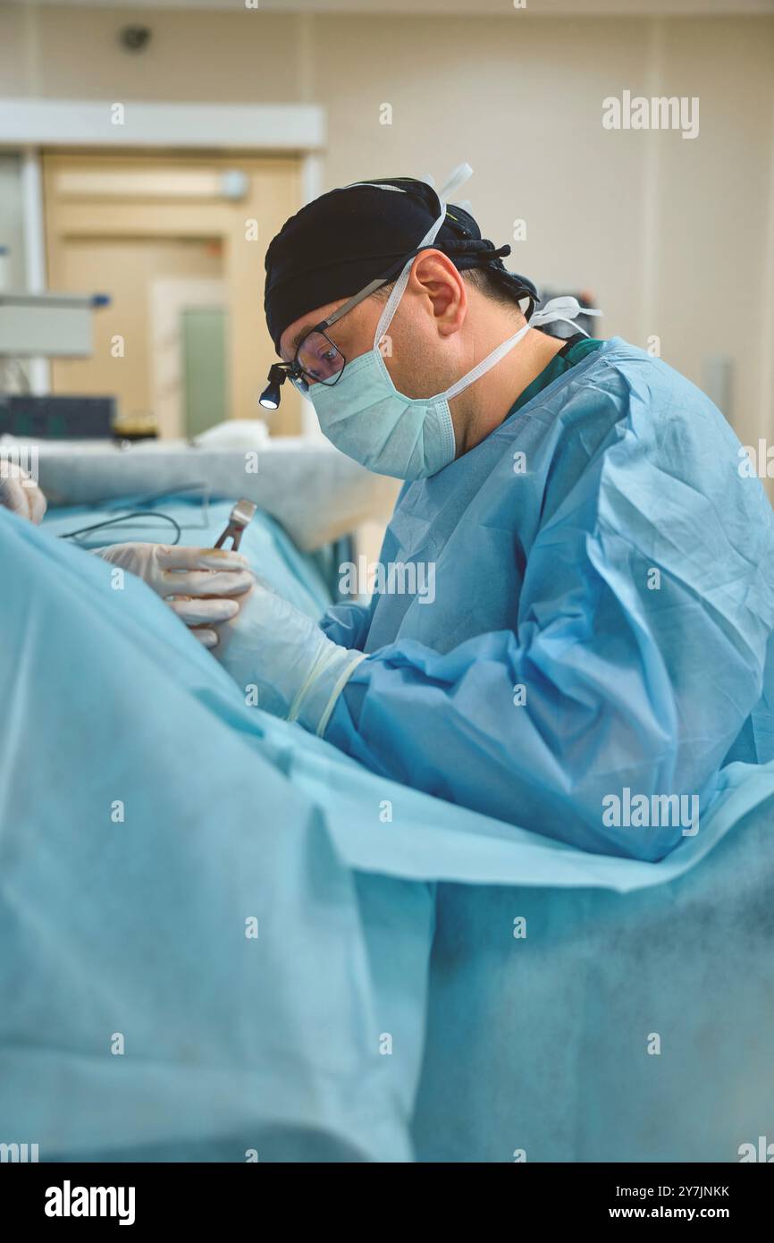surgeon operates on the patient in the operating room Stock Photo - Alamy