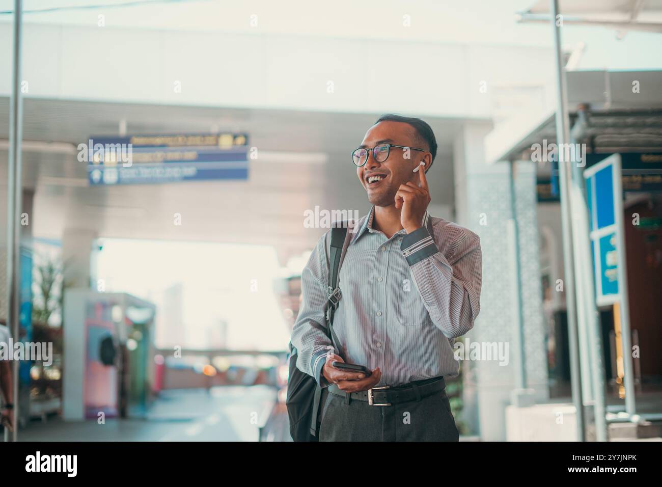 Professional businessman multitasking airport terminal hi-res stock ...