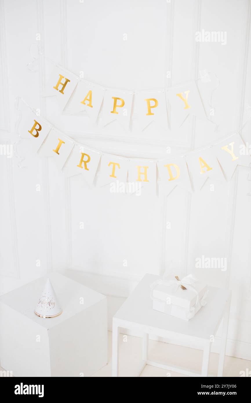 Elegant birthday party setup with gift and decorations Stock Photo - Alamy
