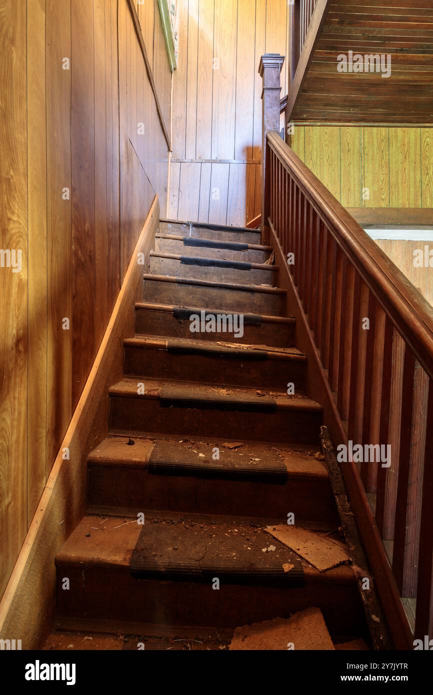 A slanted wooden staircase. The house has been demolished Stock Photo ...