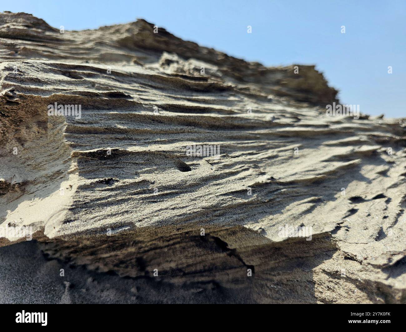 Wind erosion deflation. Aeolian landforms. Aeolian deposits sand Stock ...