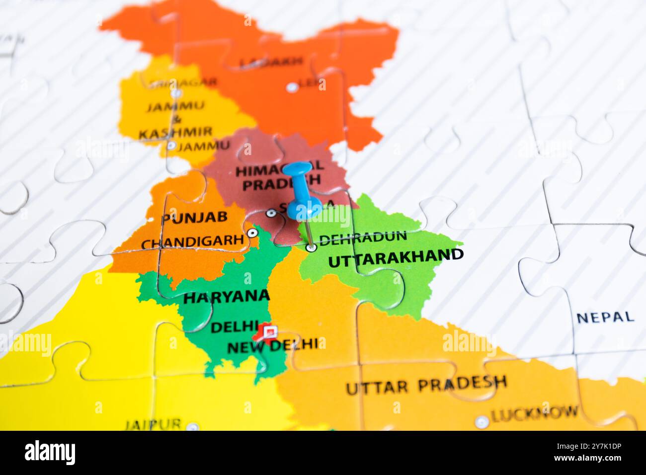 A map pin pointing Dehradun - the capital of Uttarakhand on Indian map ...