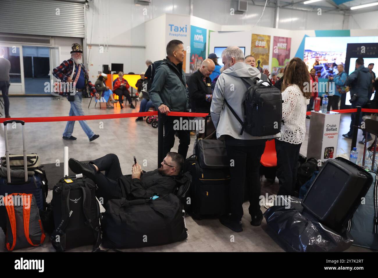 Passengers prepare to board the Villa Vie Odyssey cruise ship at ...