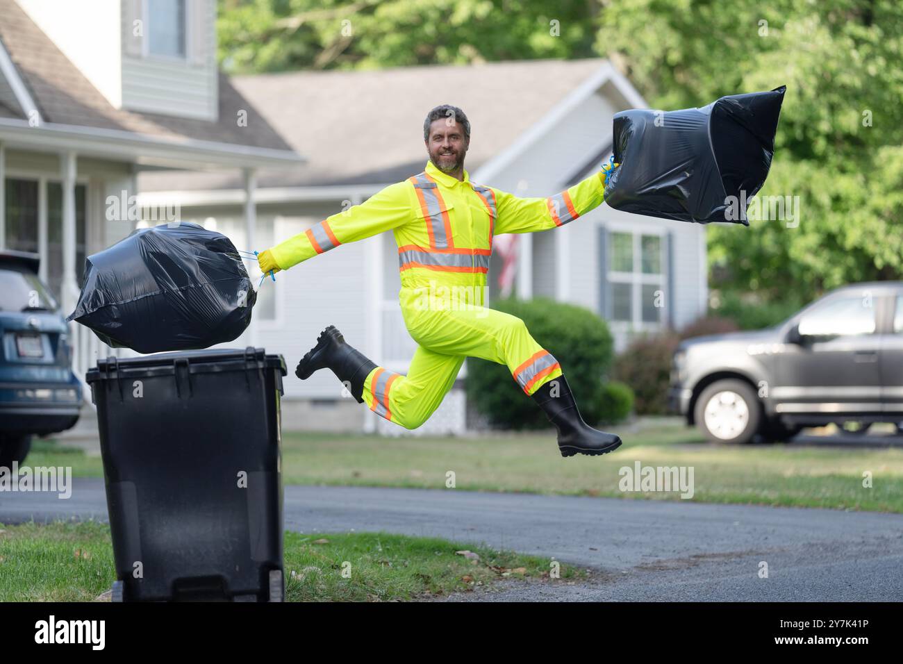 Picking up garbage plastic for cleaning. Keeping garbage plastic into ...