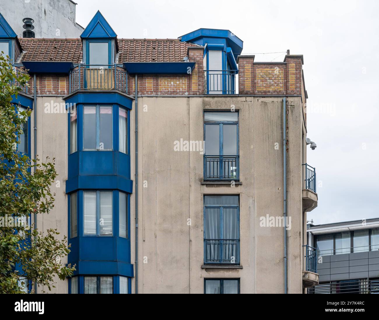 Facades of regular houses in a row in Molenbeek, Brussels, Belgium, SEP ...