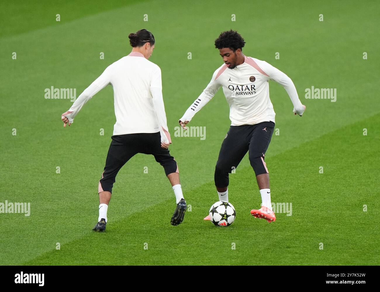Paris Saint Germain's Ibrahim Mbaye (right) during a training session ...