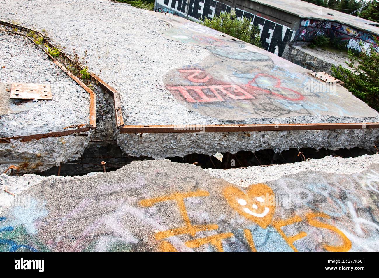 Holes in roof of radar building at Red Cliff Radar Station in Logy Bay ...