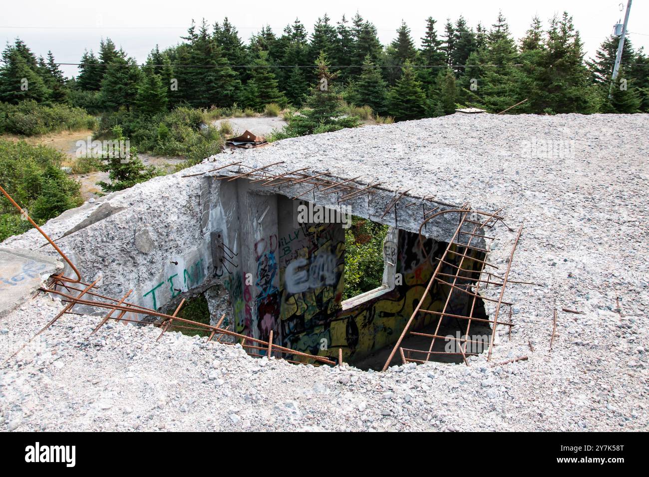 Holes in roof of radar building at Red Cliff Radar Station in Logy Bay ...