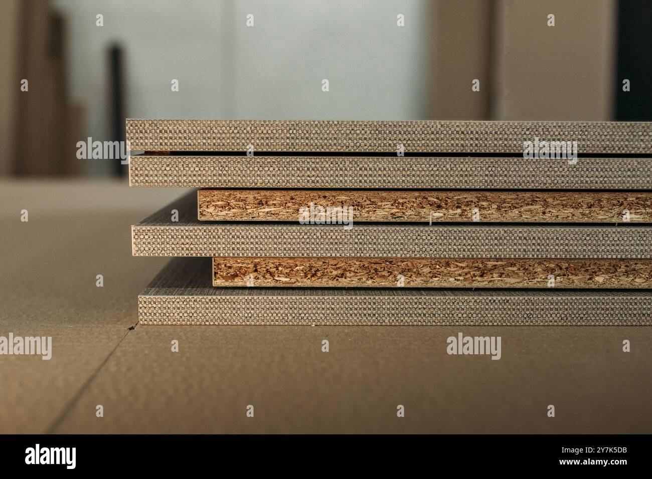 Close-up of layered plywood panels, ready for use in furniture ...