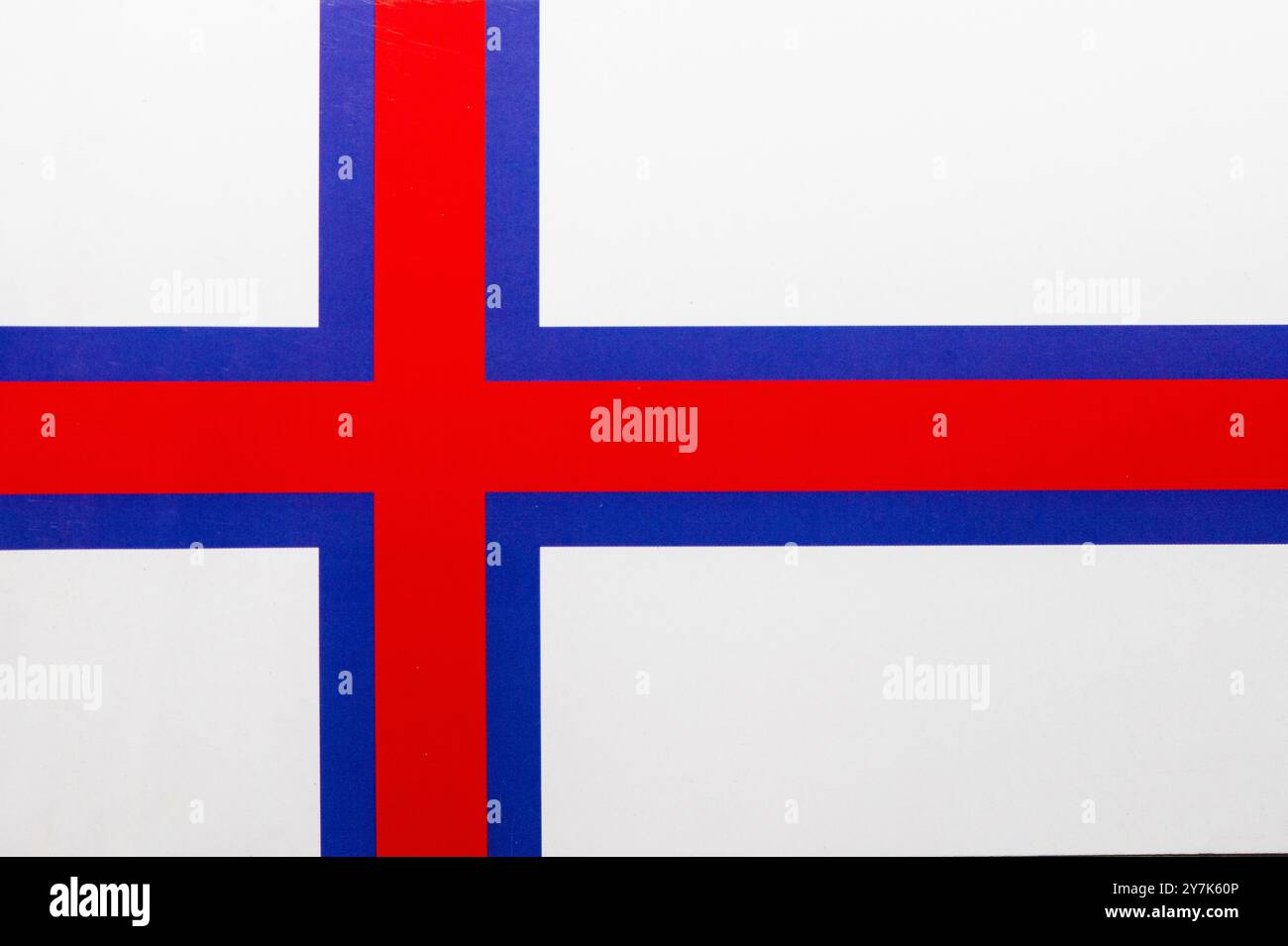 Faroe islands flag with close up under the studio light indoors. The ...