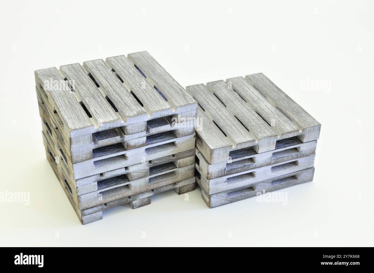 still life with wooden pallets, close up, isolated on white background ...