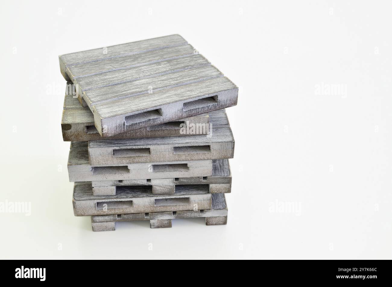 still life with wooden pallets, close up, isolated on white background ...