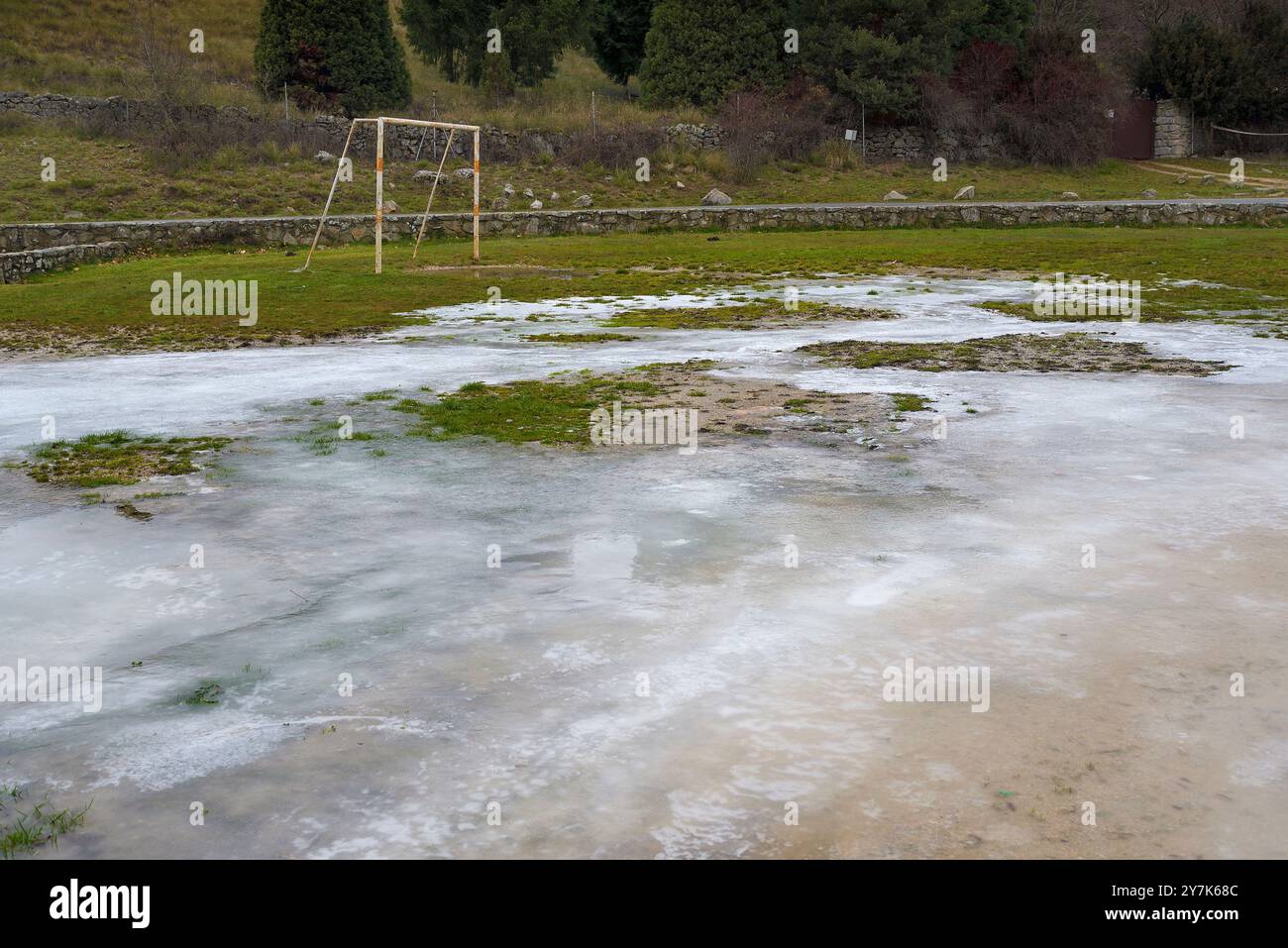 Frozen football field in La Panera. El Espinar, province of Segovia ...