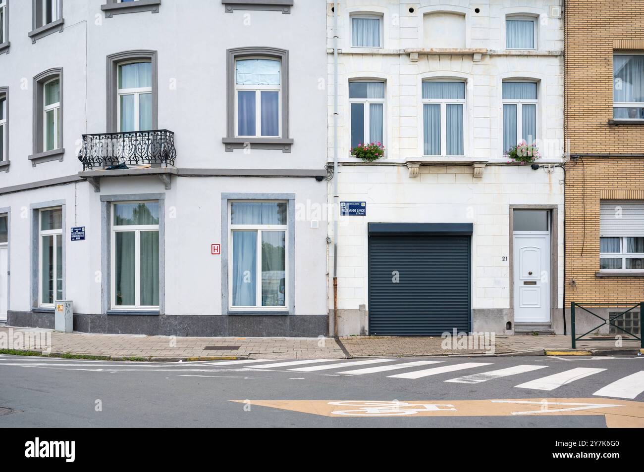 Facades of residential houses in a row in Koekelberg, Brussels, Belgium ...