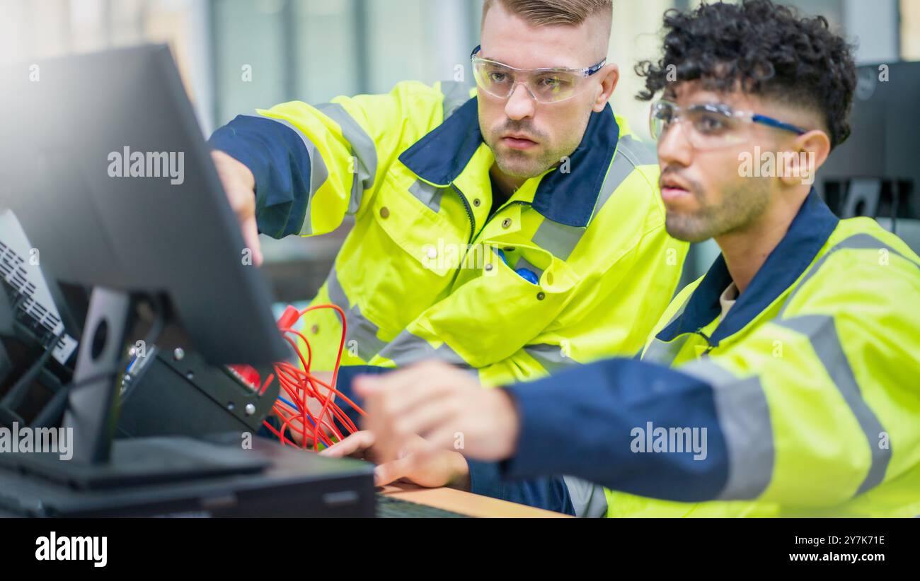 Mechanical engineering team working in robotic technology lap for ...