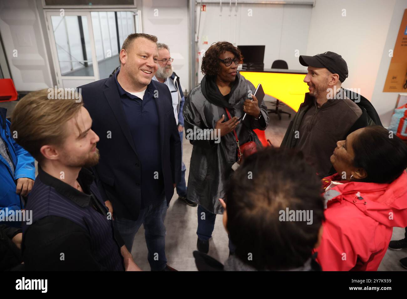 CEO of Villa Vie Residences Mikael Petterson (2nd left)speaks to ...