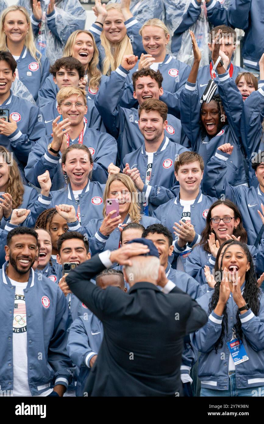 Washington, USA. 30th Sep, 2024. Athletes react as US. President Joe ...
