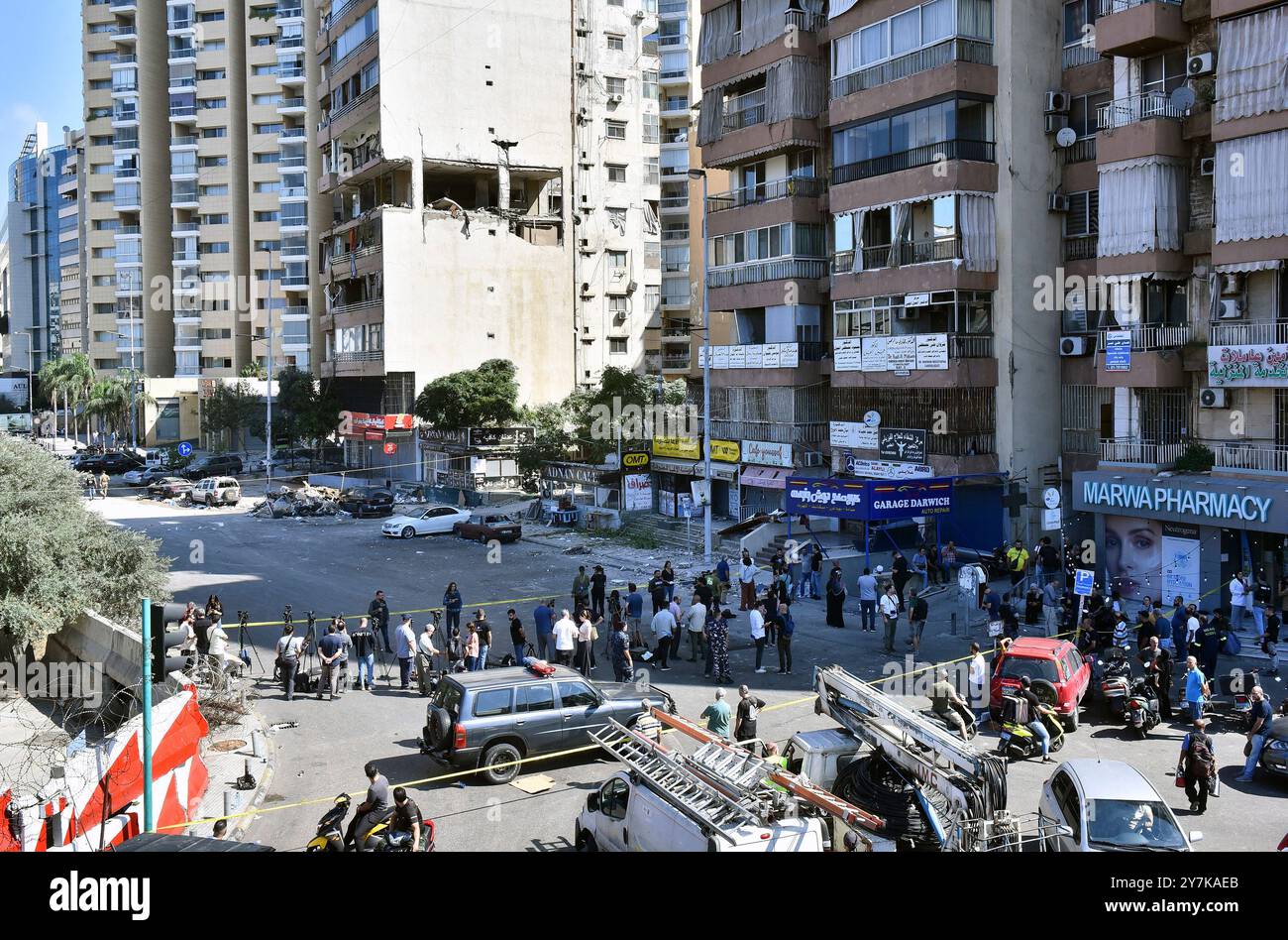 Soldiers secure the area as press member are seen after three leaders ...