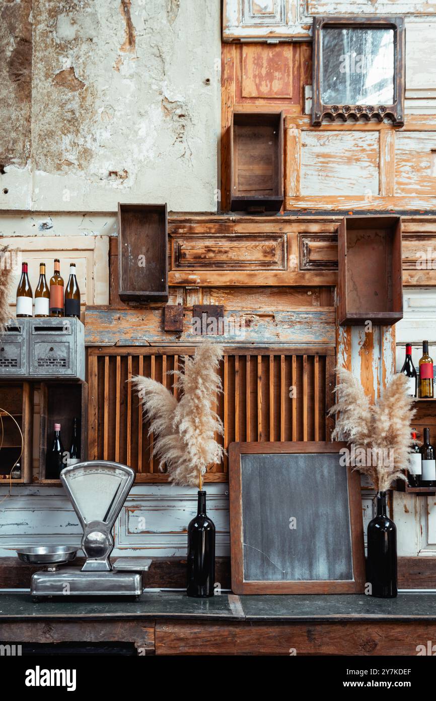 Rustic vintage wall decoration with a collection of empty wooden ...