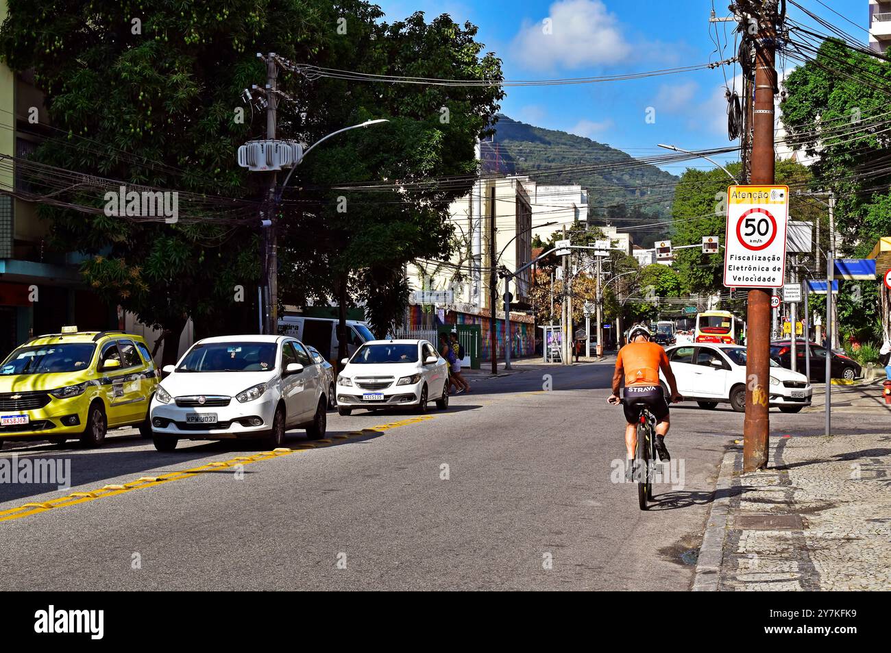 RIO DE JANEIRO, BRAZIL - September 18, 2024: Cyclist on typical street ...
