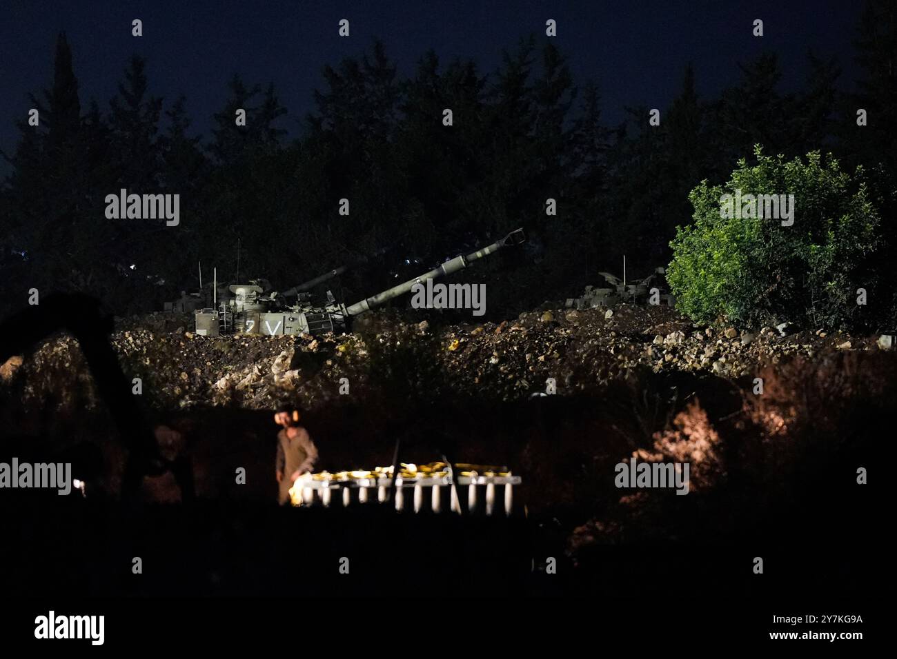 An Israeli mobile artillery unit is seen near the Israel-Lebanon border ...
