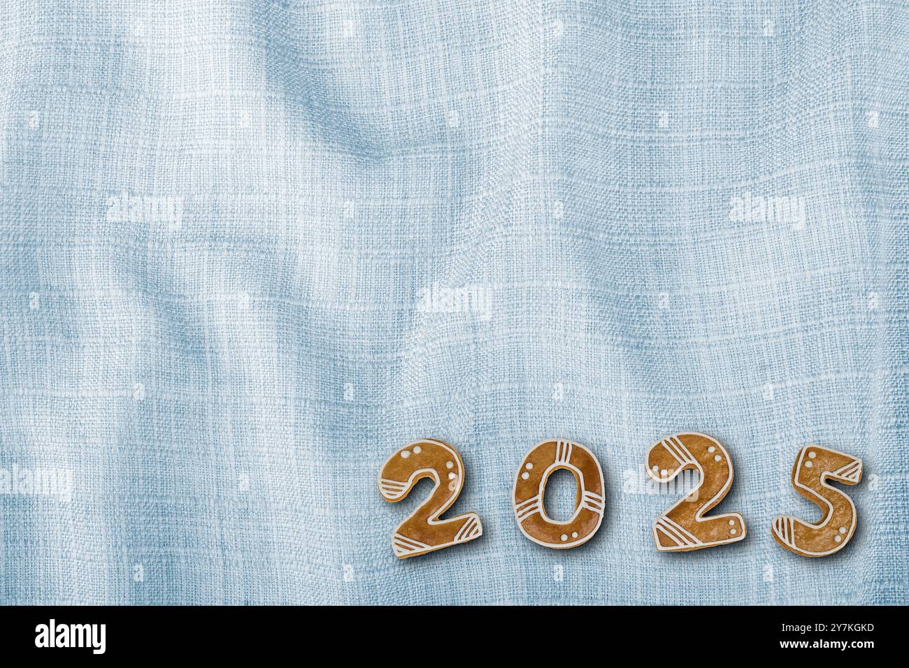 Decorative gingerbread for 2025 New year greetings on dynamic blue ...